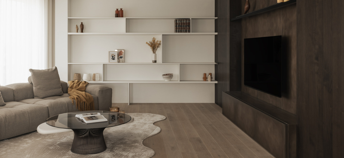 Apartment blends Shinnoki Stardust Walnut with stone & metal