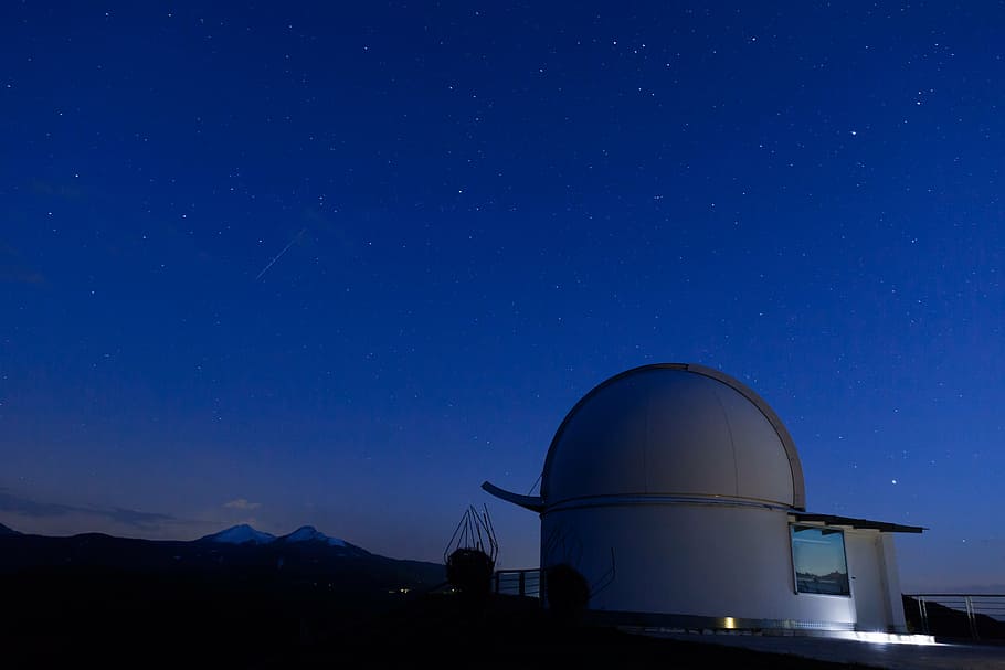 A dome-topped observatory against twilit sky