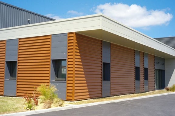 Bardage métallique effet bois | Joris Ide France