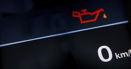 What causes engine oil consumption?